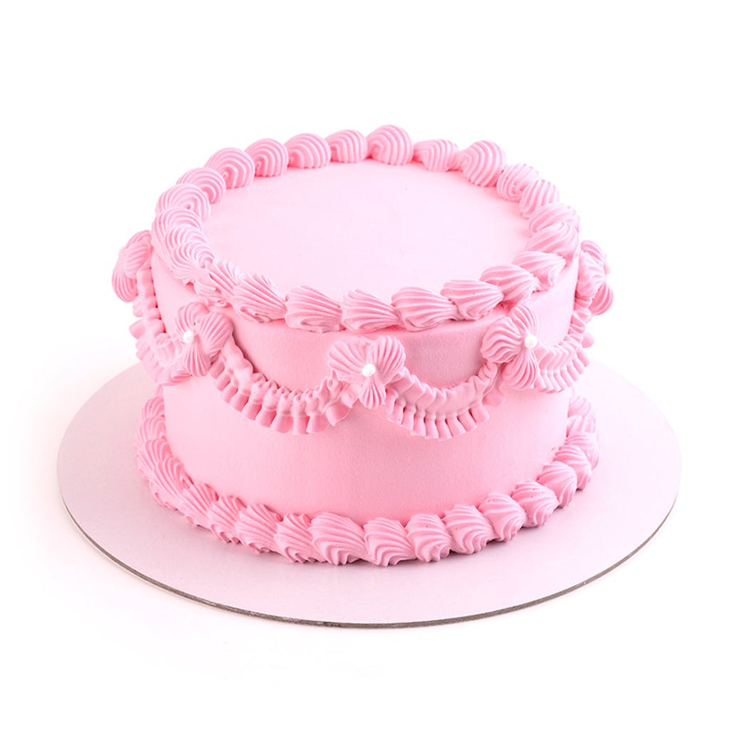 light pink circle cake